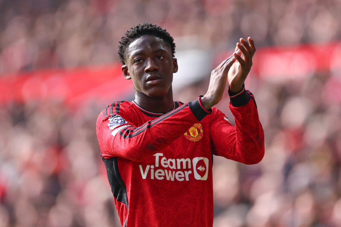 Manchester United's Kobbie Mainoo reacts to Leny Yoro amid Spurs links